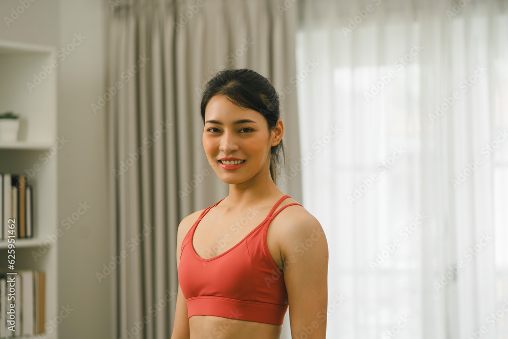 Finding motivation in her fitness journey, a young Asian woman ... Finding motivation in her fitness journey, a young Asian woman ...