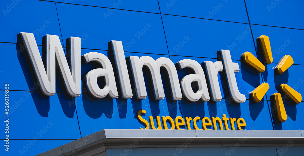 Walmart superstore exterior facade brand and logo signage. Walmart is ...