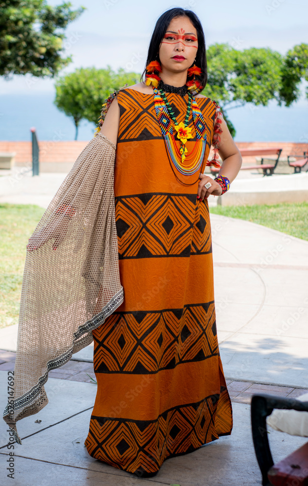 beautiful young peruvian woman of the yanesha culture posing with ...