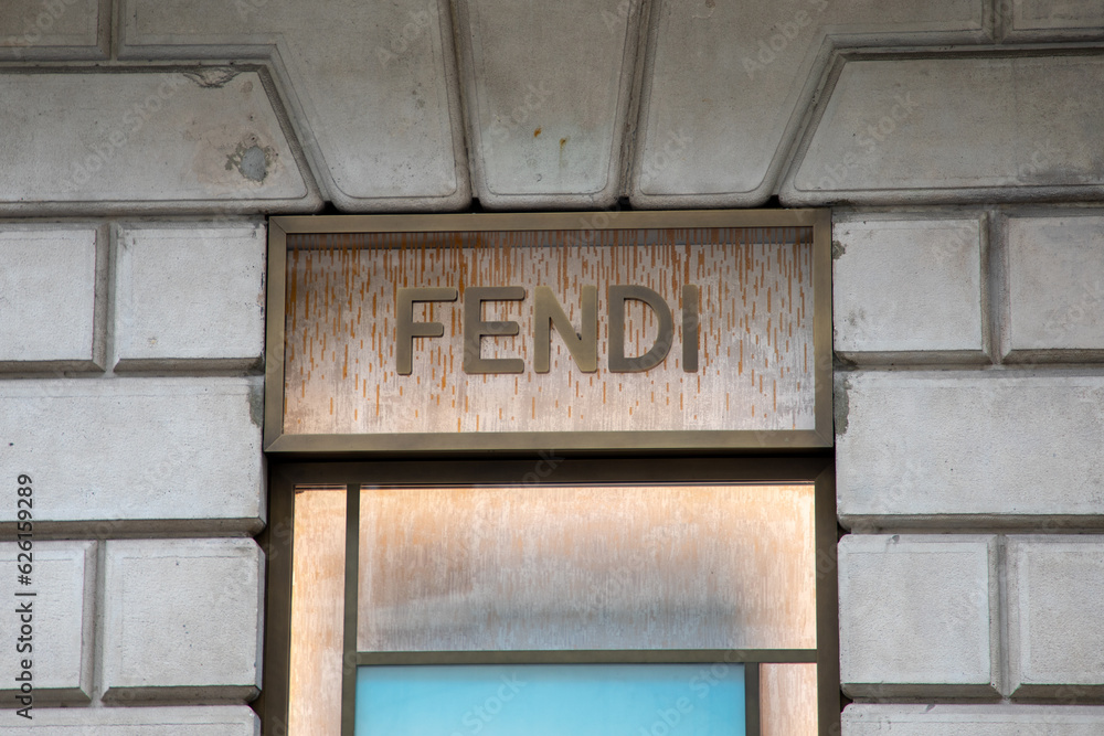 Fendi logo sign chain and brand text on store facade boutique clothing ...
