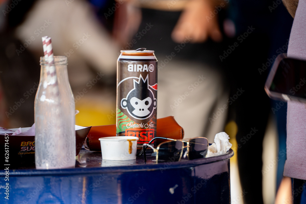 Fotografia do Stock: Can of Bira rise beer placed on top of a table in ...
