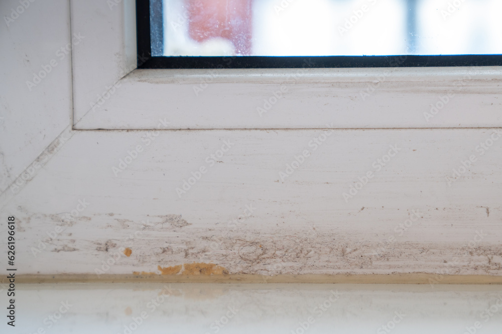Part of dirty window frame after installing plastic windows and ...