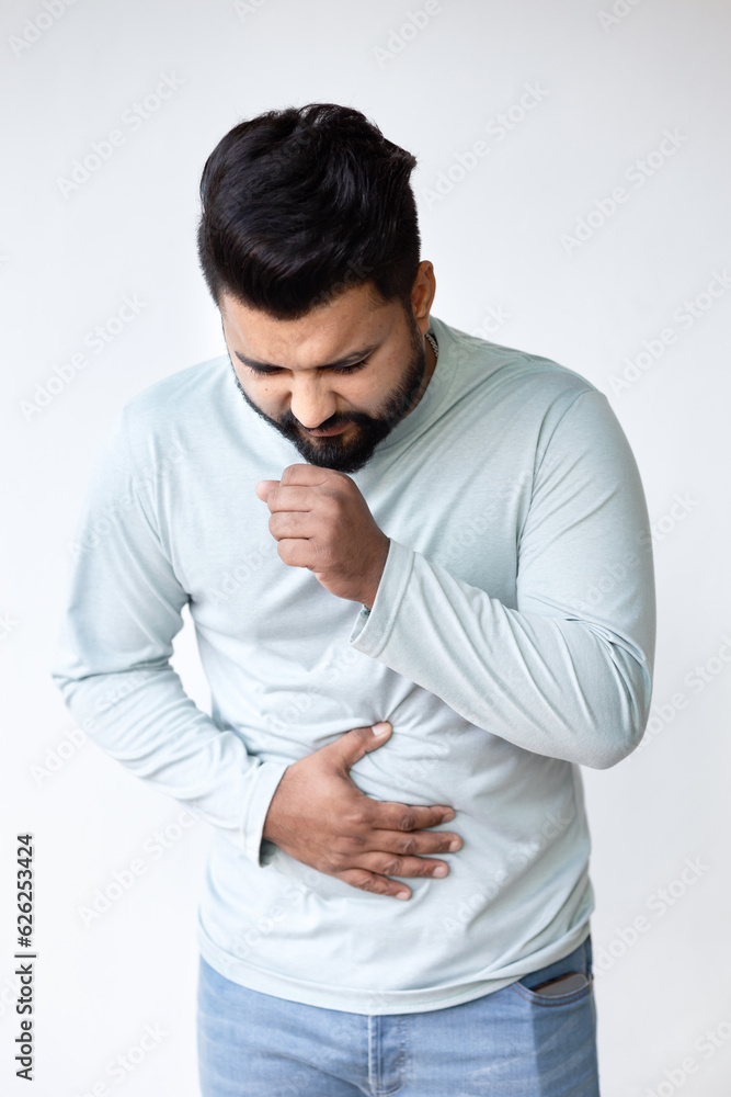 Ill South asian Indian man with stomachache concept image for hungry ...