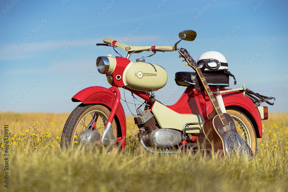 DDR Moped Simson Spatz und Gitarre Stock Photo | Adobe Stock