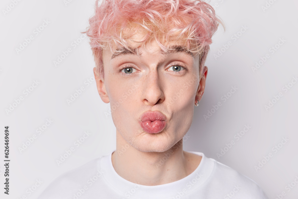 Human facial expressions. Handsome gay with pink hair has non ...