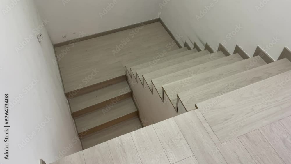 Empty stairs first person point of view staircase interior with white ...