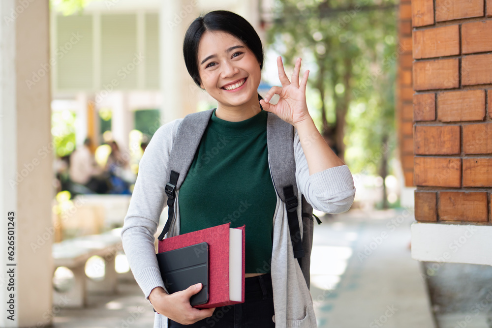 Happy Smiling Asian College Student in University Campus showing ok for ...