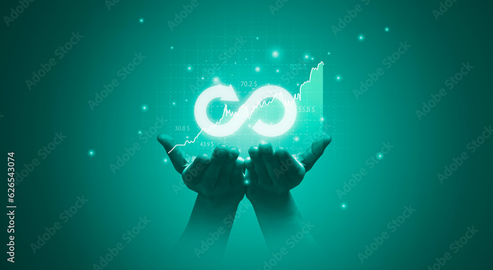Hand holding infinity sign symbol with stock market investment graph ...