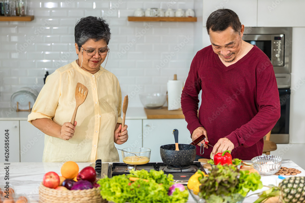 Couple senior Asian elder happy living in home kitchen. Elderly couple ...