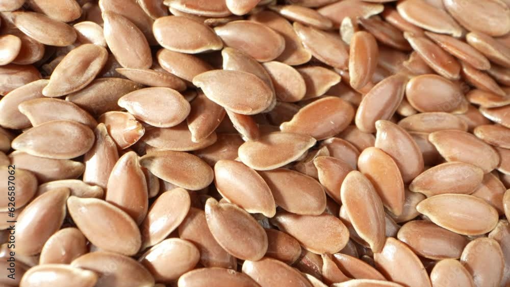 The macro video captures the fascinating textures of flax seeds when ...