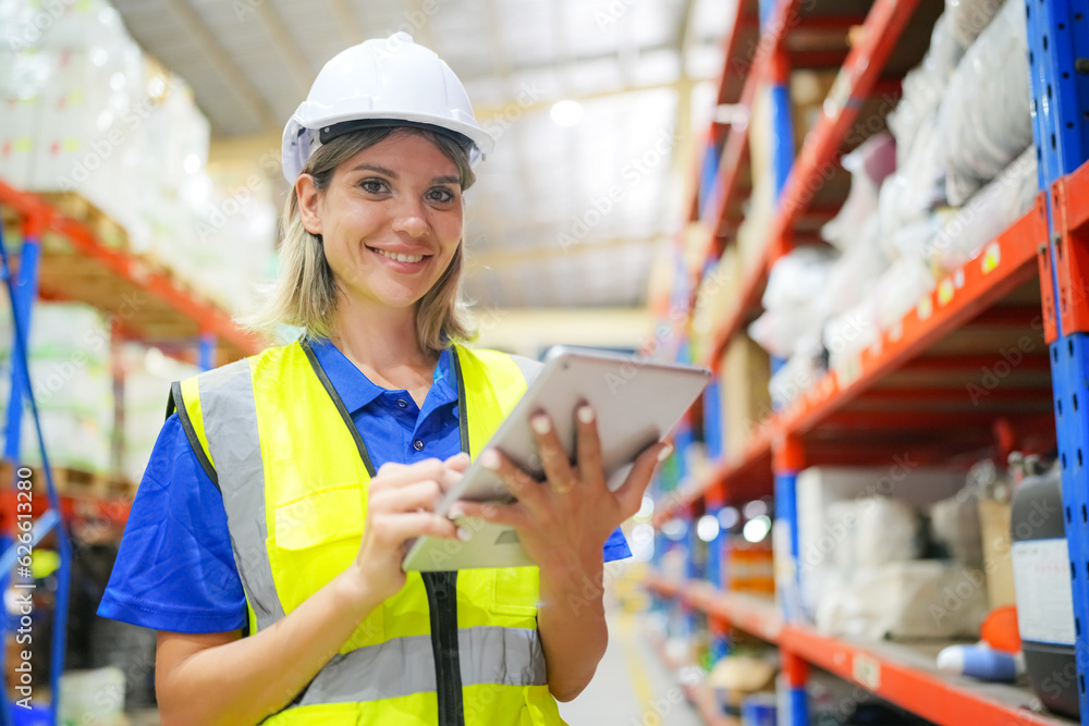 Warehouse workers checking the inventory. Products on inventory shelves ...
