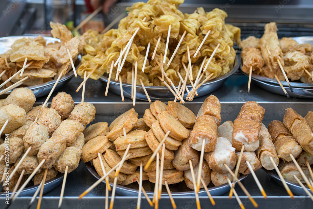 Asian street food, lok lok, meat and fish cakes on skewers. Stock Photo ...