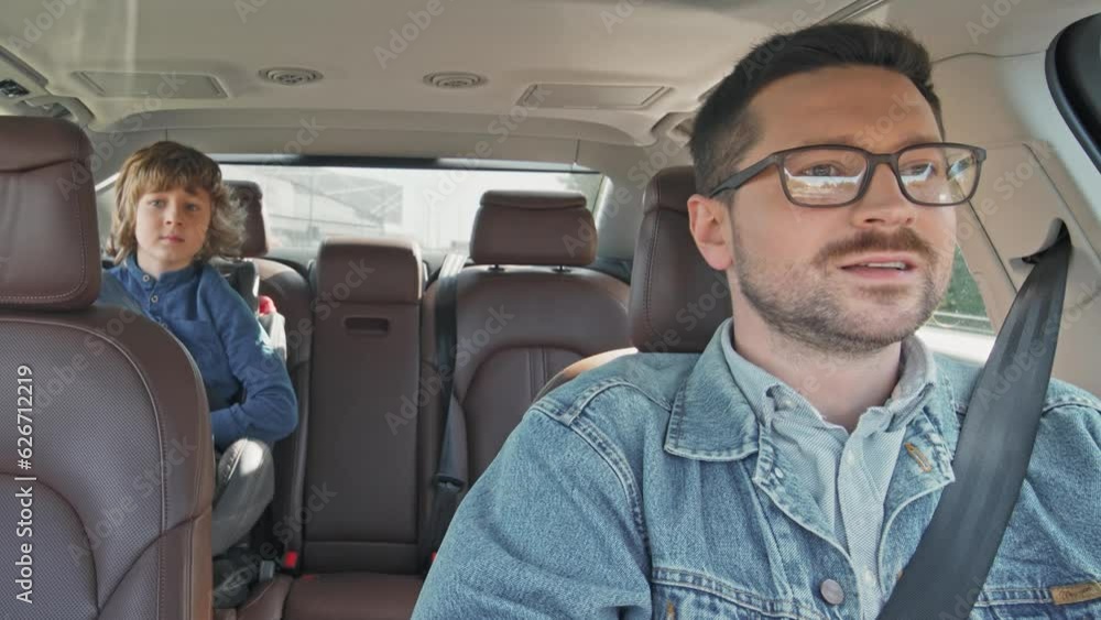 Family of father driver and boy ready to move in car to school and ...