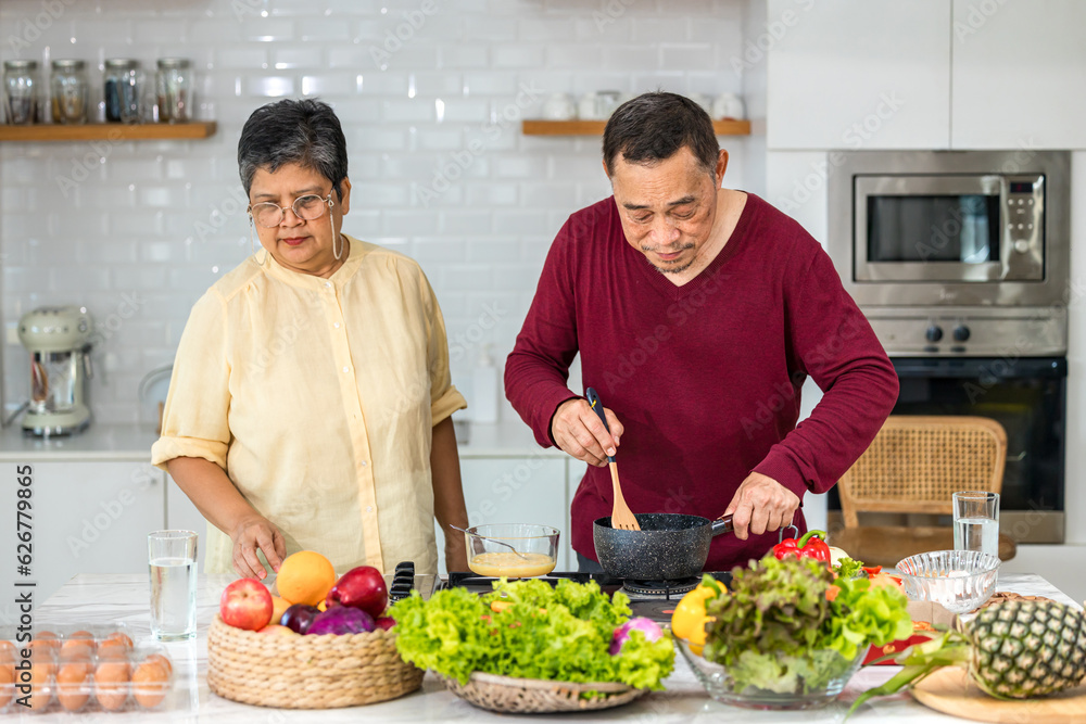 Couple senior Asian elder happy living in home kitchen. Elderly couple ...