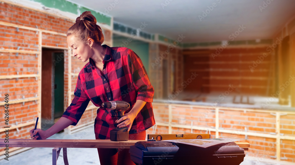 Woman carpenter. Furniture maker girl. Carpenter in renovated building ...