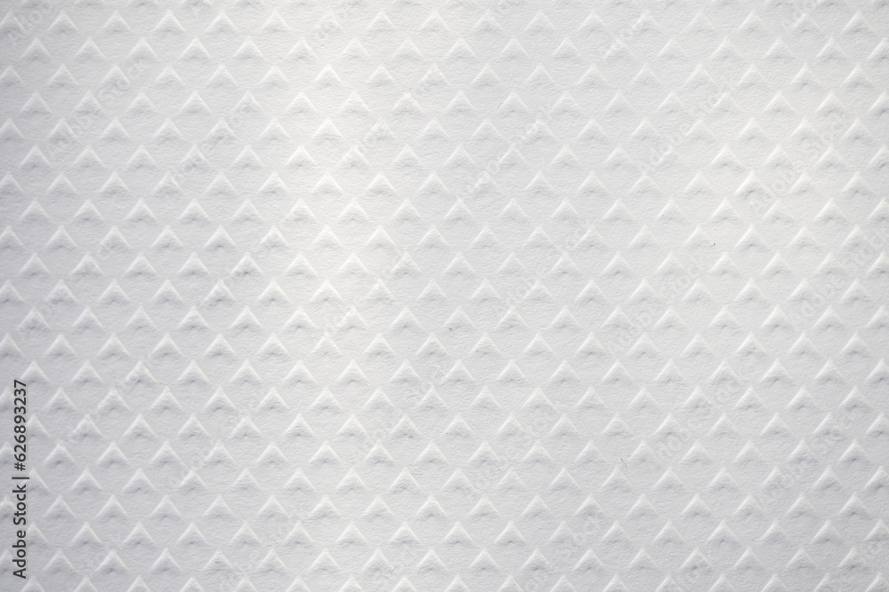 Embossed white paper with a diamond pattern. Rhombus stamped paper. Top ...
