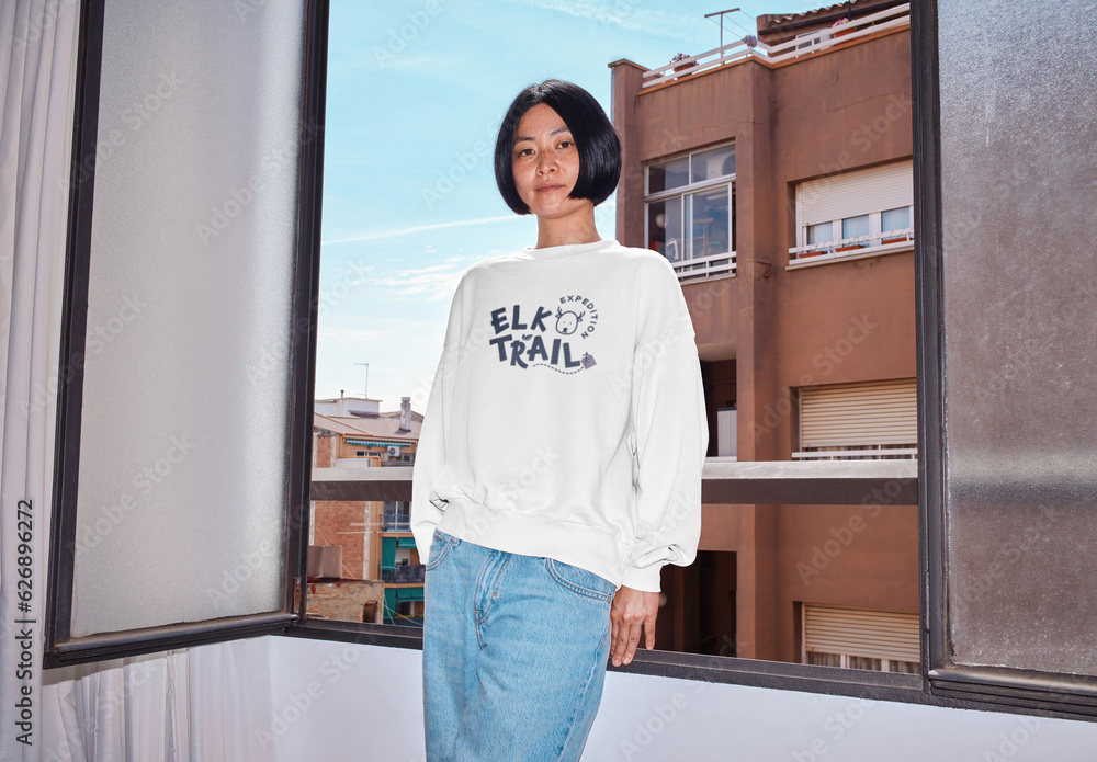 Mockup of Japanese woman wearing customizable long sleeve top by open ...