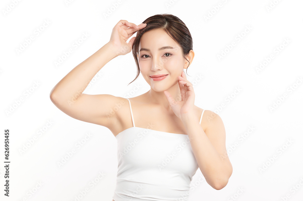 Beautiful young asian woman with clean fresh skin on white background ...