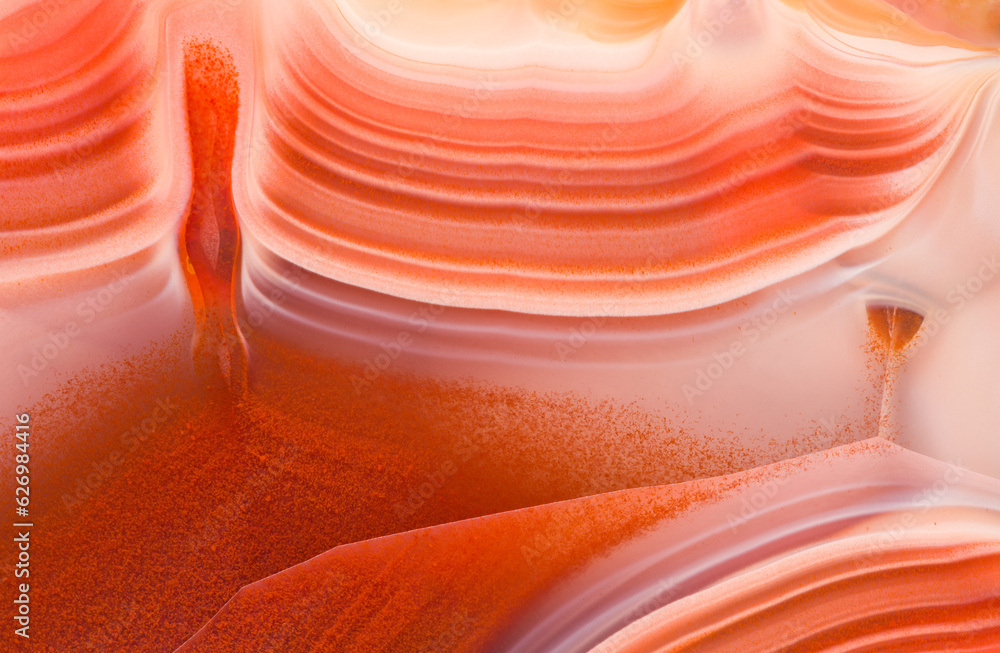 Amazing agate crystal cross section with mesmerizing layers of orange ...