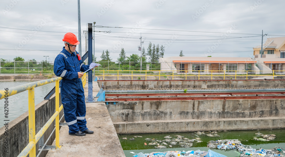 Water plant maintenance technicians, mechanical engineers check the ...