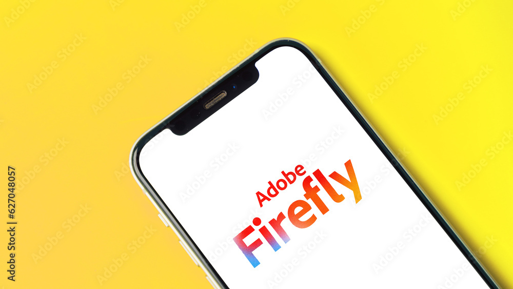 Adobe Firefly logo displayed on mobile phone screen, AI Art generator ...