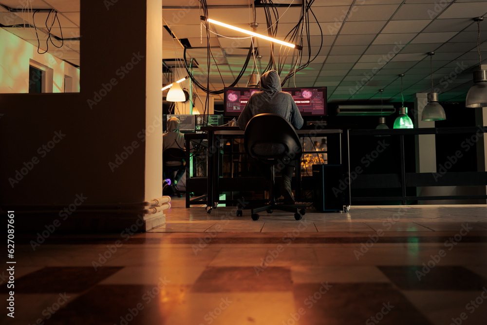 Cyberattack, criminal hacking computer system, sending malicious software, breaking into ...