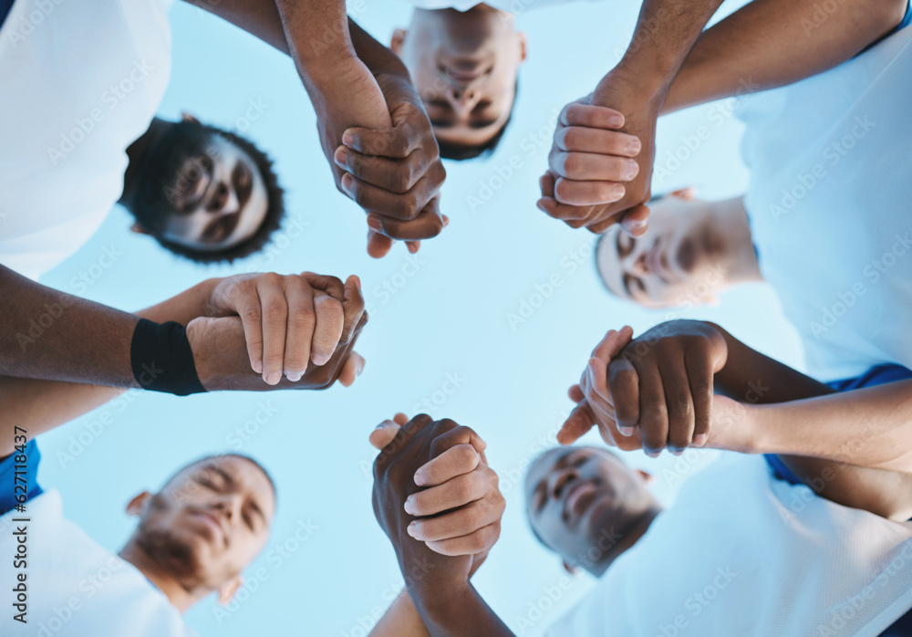 Sports, teamwork and praying with hands of soccer player on field for ...