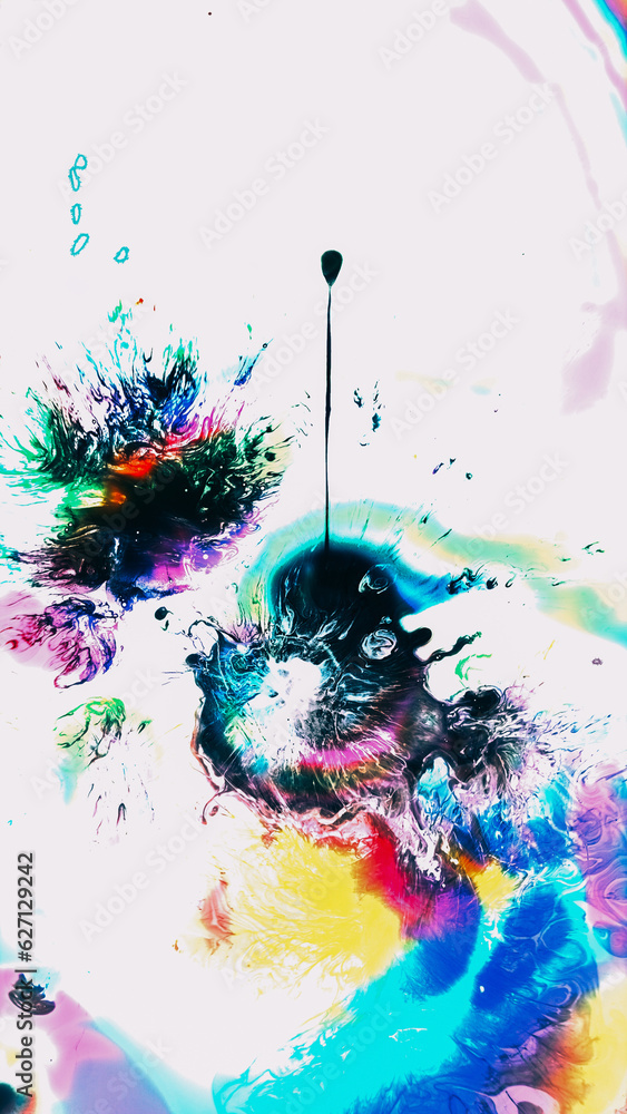 Color dropping. Acrylic swirl. Fluorescent drip ink splash on bright ...