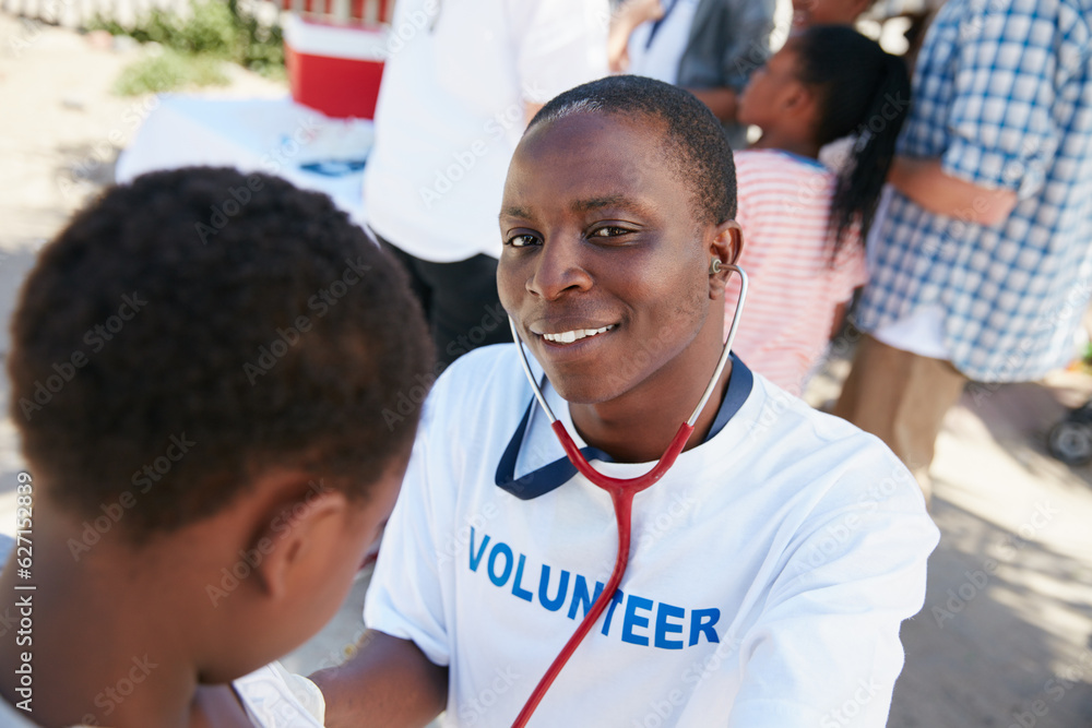 On a mission to provide great medical care. Shot of a volunteer doctor ...