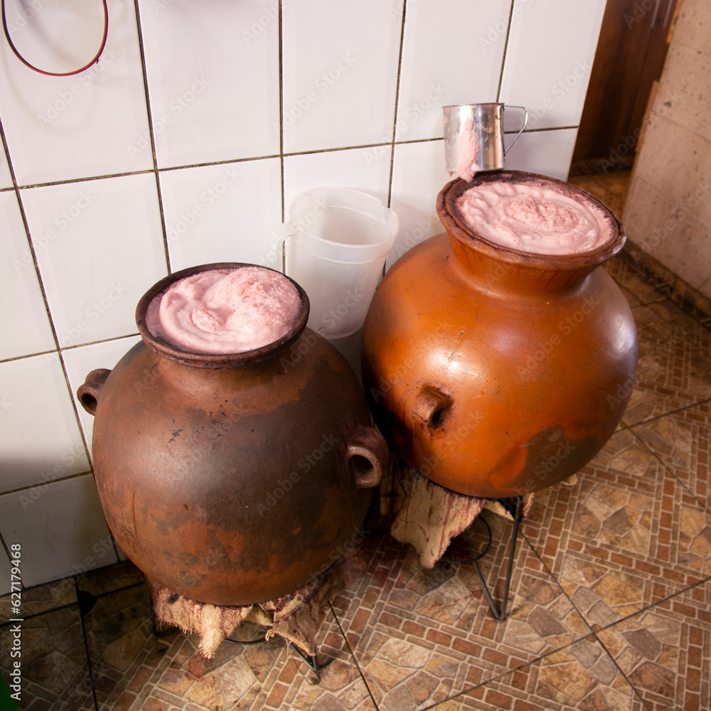 Chicha morada. Traditional peruvian drink prepared in clay pots, a ...