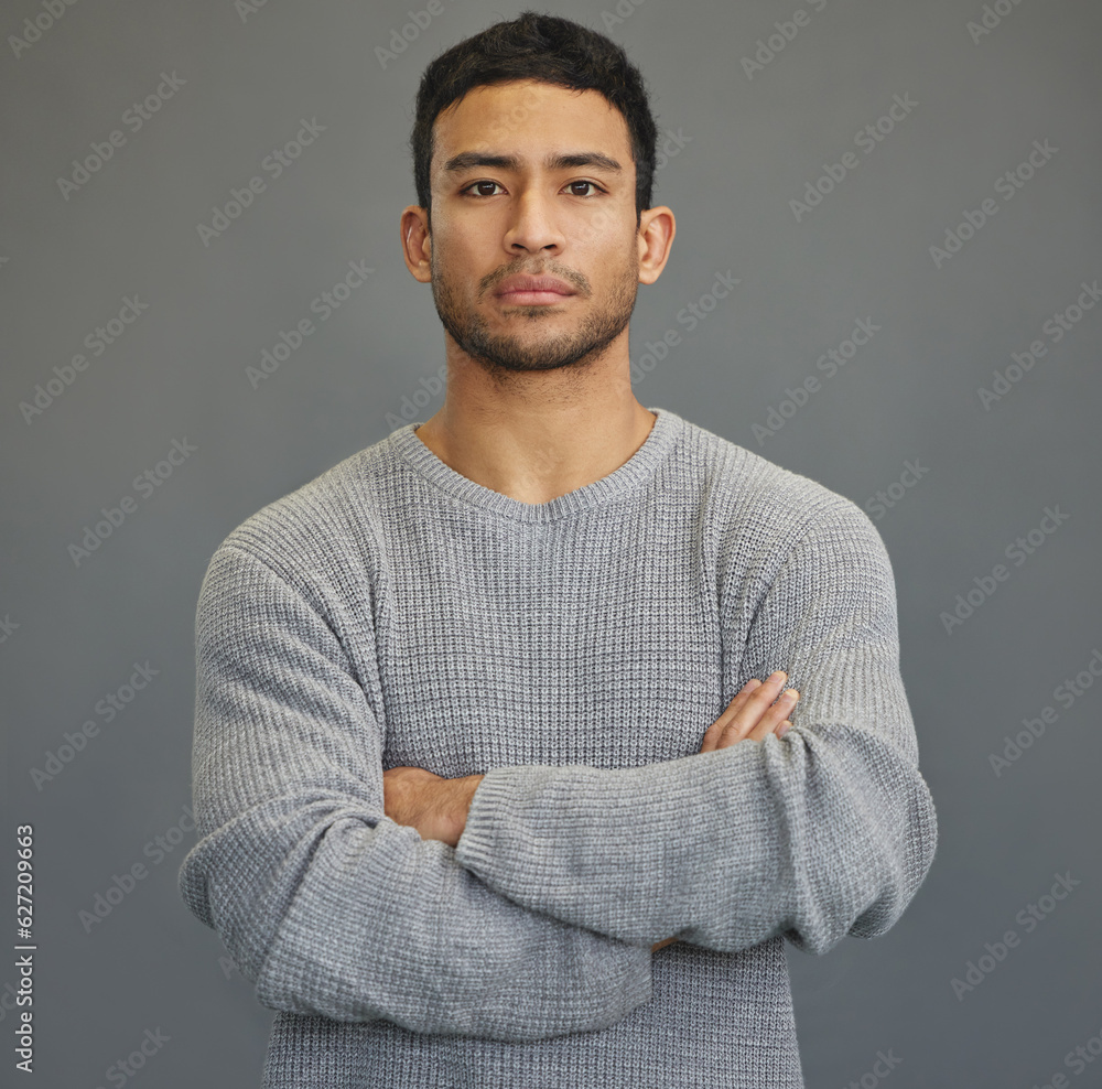 Serious, arms crossed and portrait of man in studio for attitude, moody ...