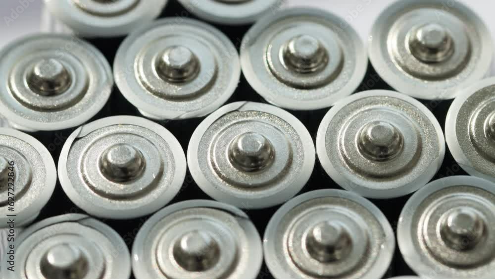 A lot of alkaline charged batteries with different polarity and power ...
