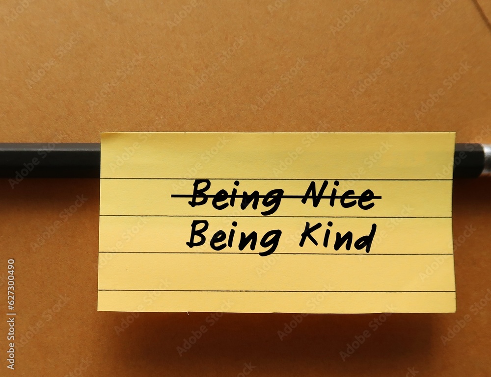 Note stick on pencil and office envelope with handwritten text BEING ...