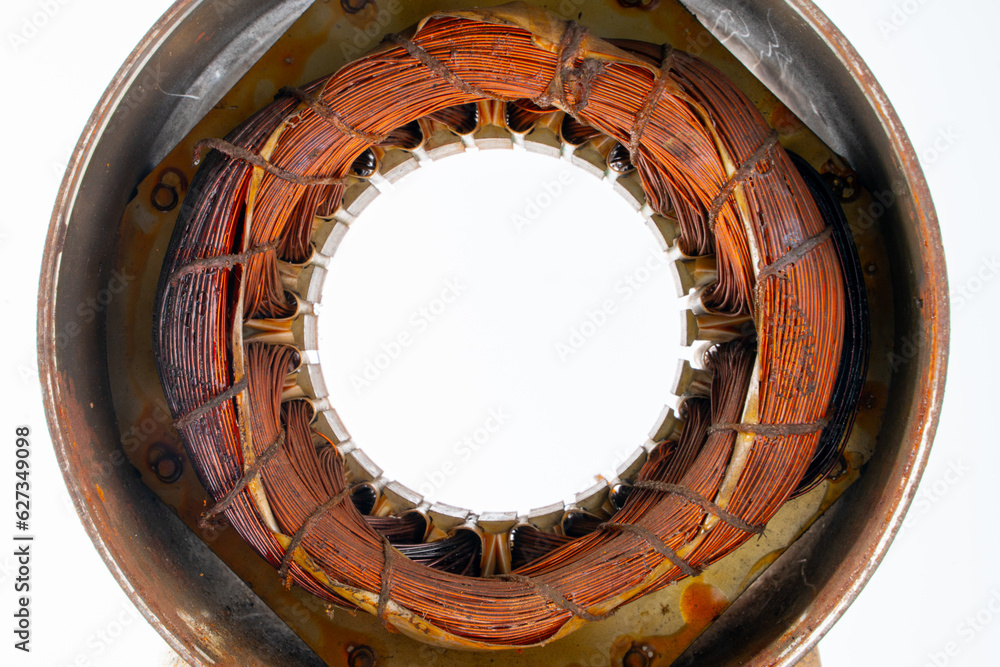 Old Field Coil Motor on a white background, A field coil is an ...