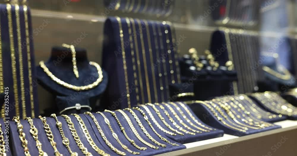Rings, bracelets and necklaces with diamond jewelry are on display in ...