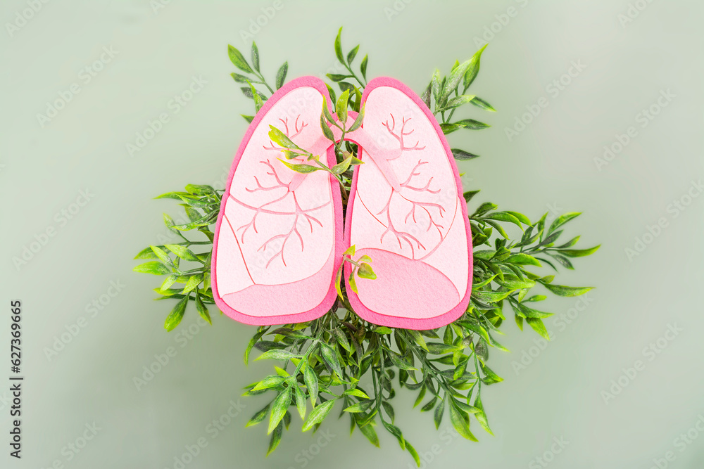 Healthy pink lungs over green foliage. World Tuberculosis Day ...