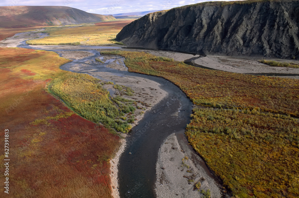 Aerial view of the colourful landscape showing rivers and hills in the ...