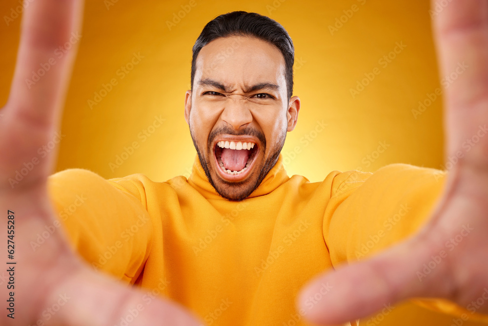 Shouting, portrait and selfie of angry man in studio isolated on a ...