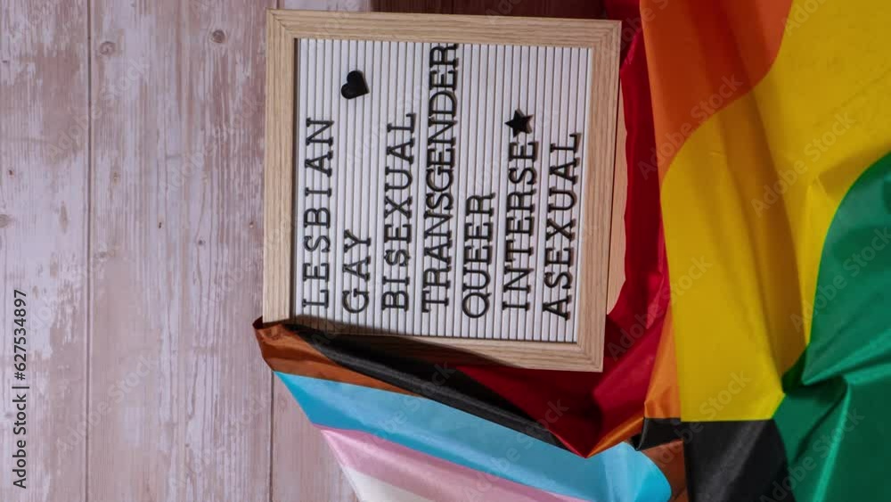Vertical Zoom in out LGBTQIA description frame on Rainbow LGBTQIA flag ...