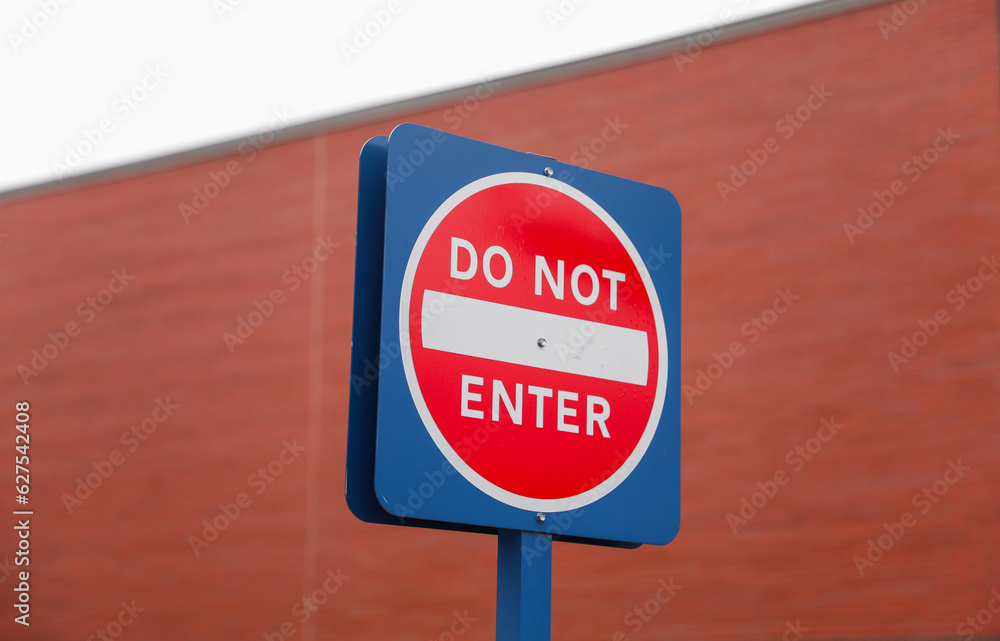 Symbolic 'Do Not Enter' street sign, cautioning against unauthorized access and deterring from ...