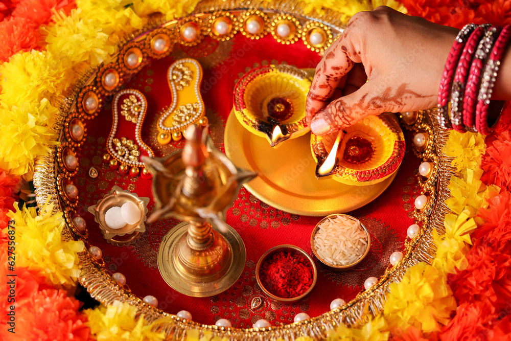 Fotka „Beautifully Decorated Pooja Thali for festival celebration to ...