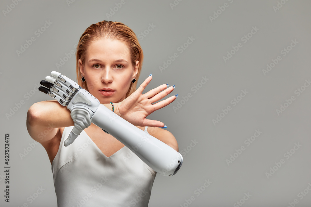 Studio portrait of beautiful young girl with disability wearing sensory ...