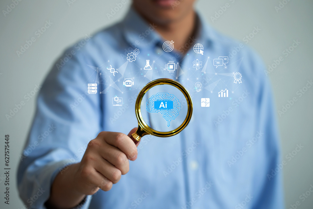 Artificial Intelligence. businessman holding magnifying glass with Ai icons around it ...