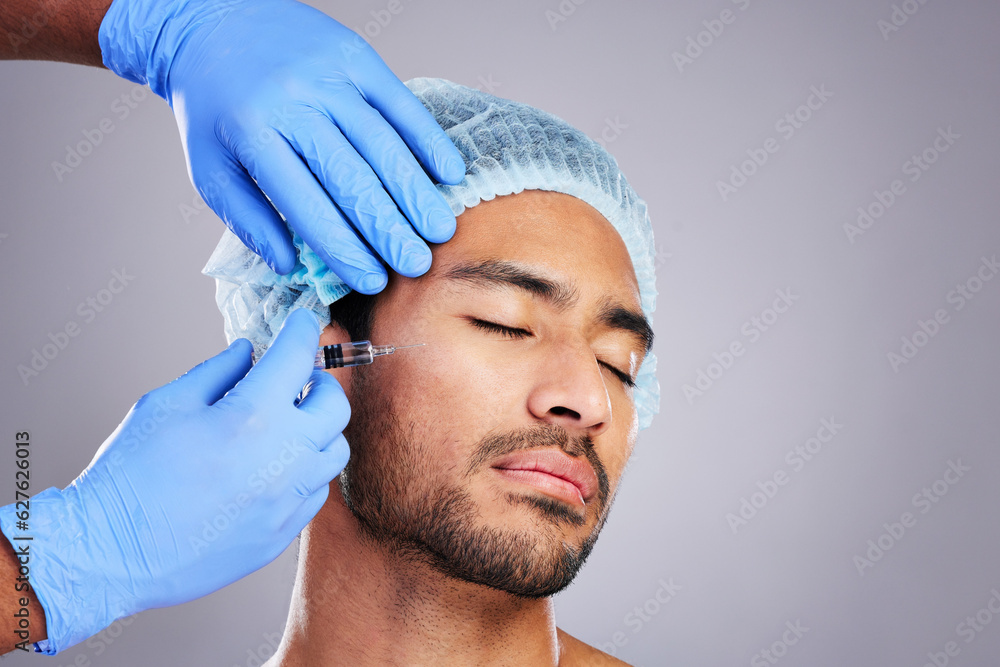 Hands, aesthetic and plastic surgery with a man in studio on a gray ...