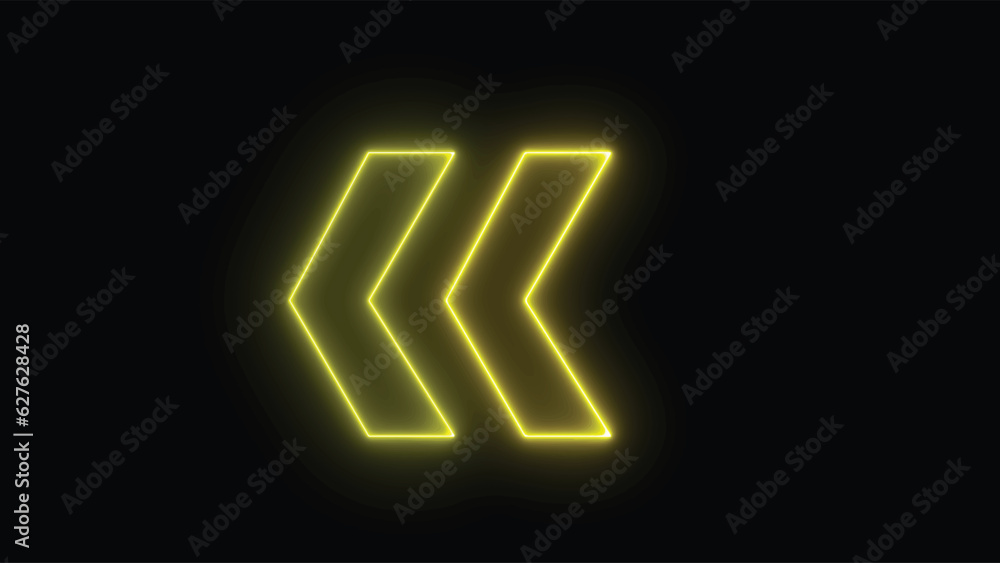 Bright yellow arrow for evacuation direction illuminated indoors. neon ...