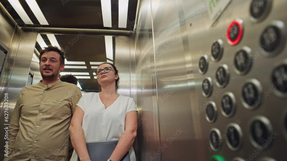 Office Romance Unveiled: Intimate Moment of a Man and Woman Kissing in ...