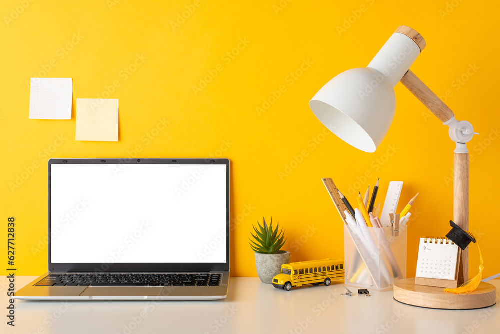 Productive study setup. Side view photo of desk with stationery ...