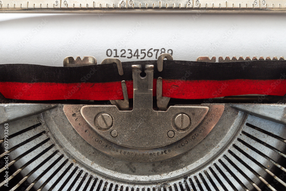 typing with an old typewriter. The numbers from 0 to 9 and the ...