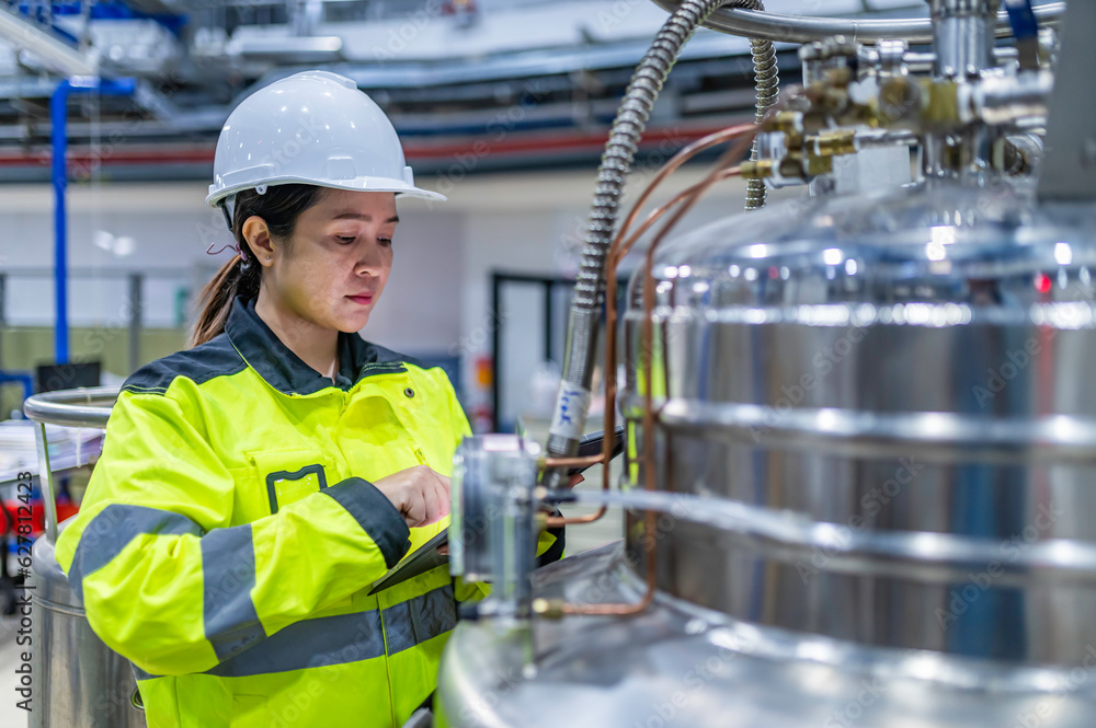Asian engineer working at Operating hall,Thailand people wear helmet ...