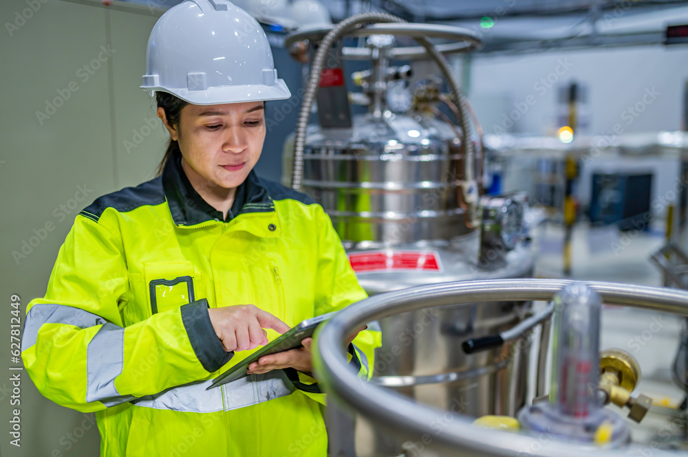 Asian engineer working at Operating hall,Thailand people wear helmet ...